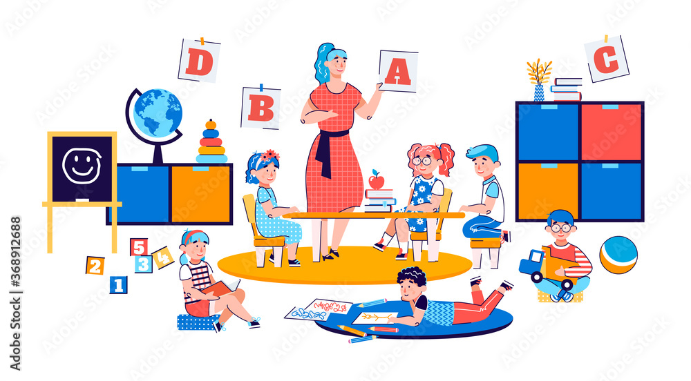 Kids play educational games in kindergarten. Children in a class with a ...