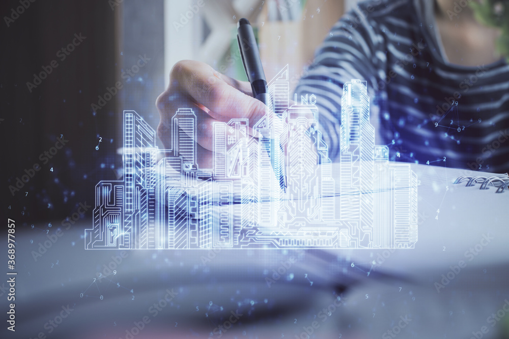 IOT drawing over writing hands in notepad background. Concept of smart ...