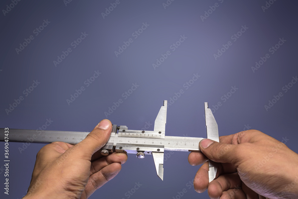 Two hands which are belongs to authentic hard working men holding ...