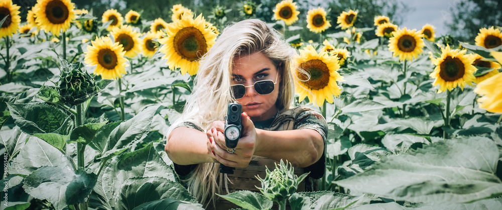 Beautiful and attractive female army soldier with gun. Woman with ...