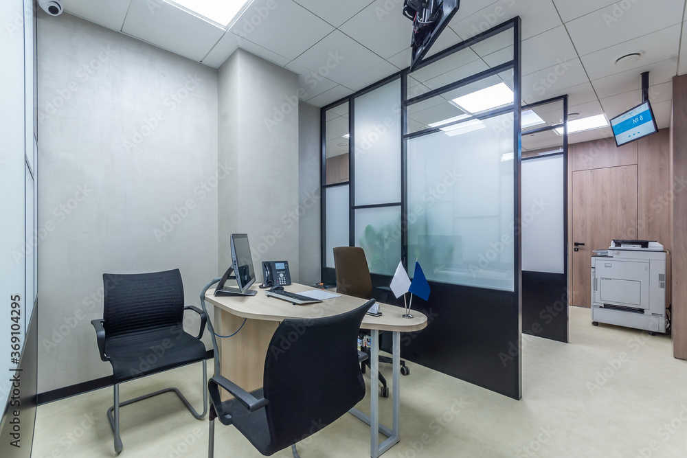 Workplace close view, with the computer, telephone on desk. Modern ...
