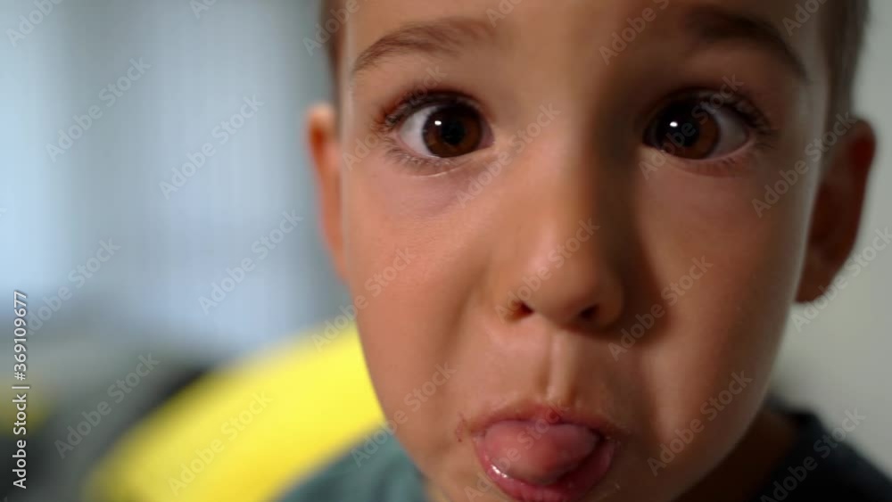 Close up portrait of small caucasian boy chewing - Little kid face ...
