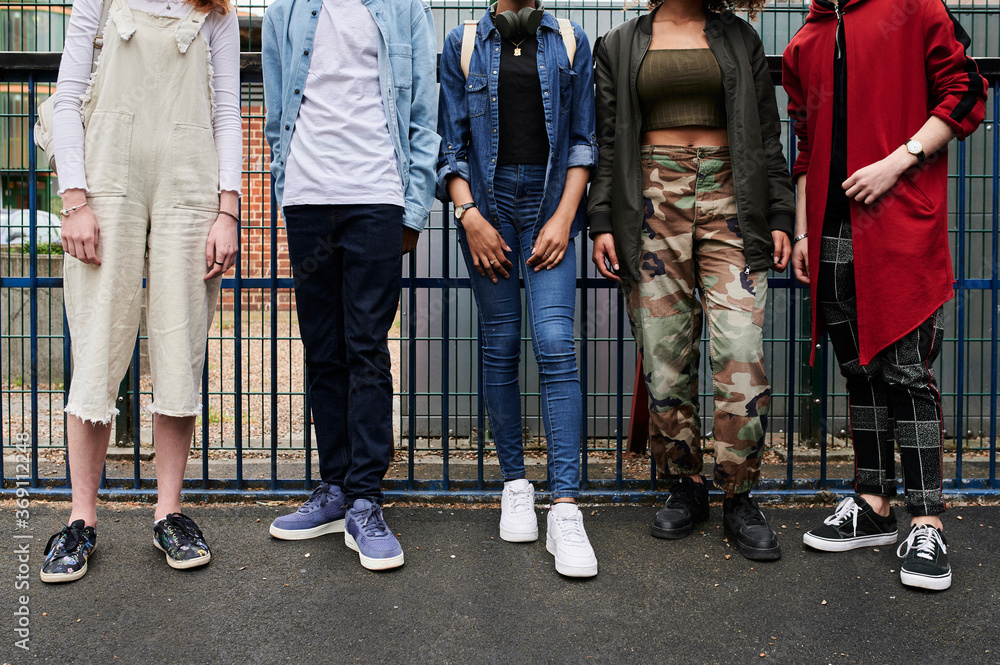 Faceless group of teens. Stock Photo | Adobe Stock