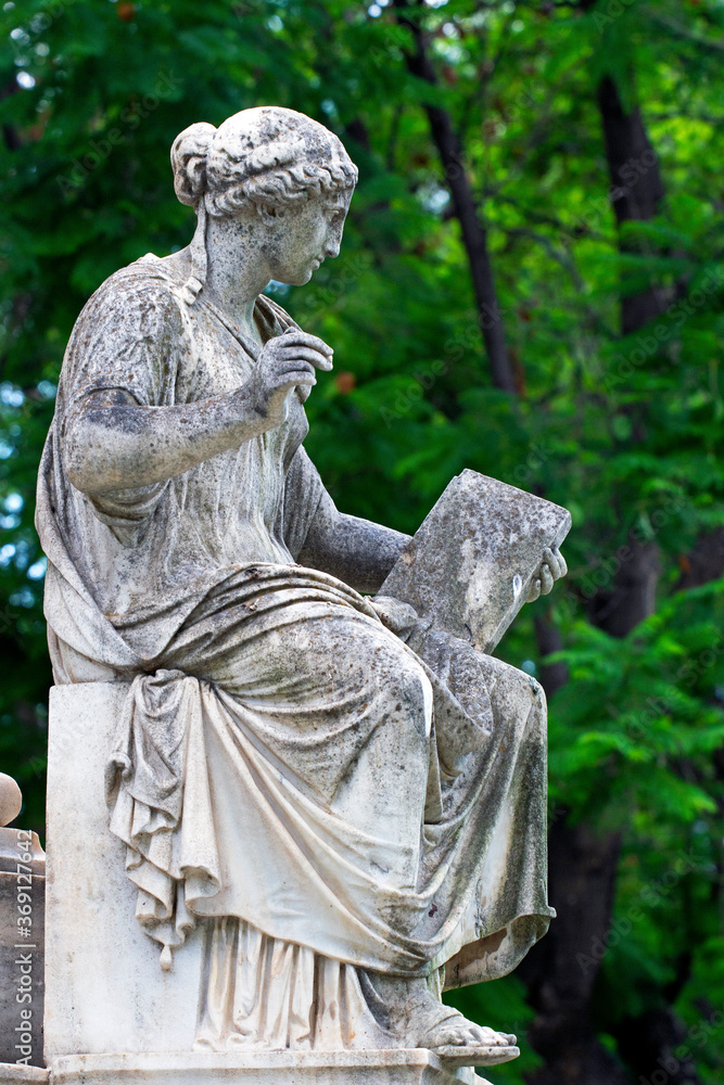 Marble statue on the base of the statue of Ioannis Varvakis in the ...