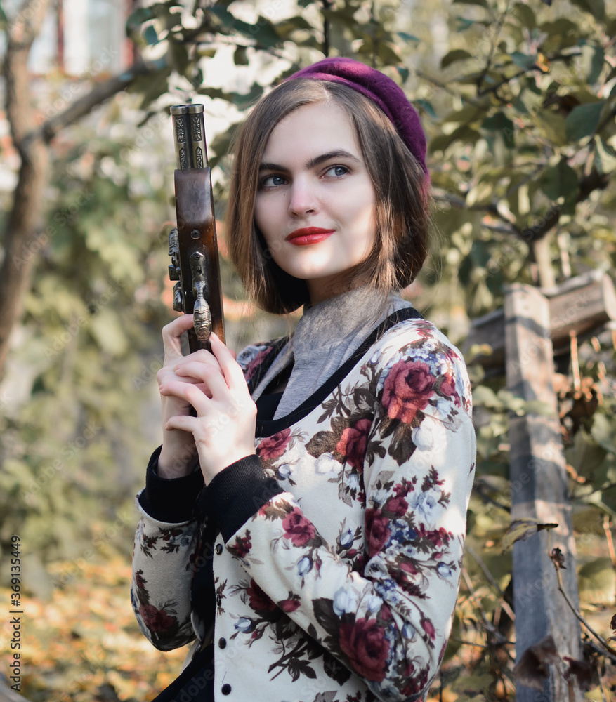 Girl with a double-barreled shotgun. The girl-bandit grabbed the man by ...