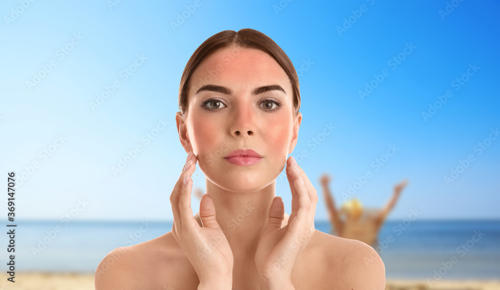 Woman with sunburn on beach. Skin protection from sun in summer Stock ...