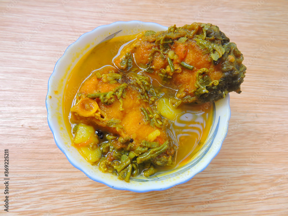 Famous Assamese recipe called Machor Tenga in Assam. This is a very ...