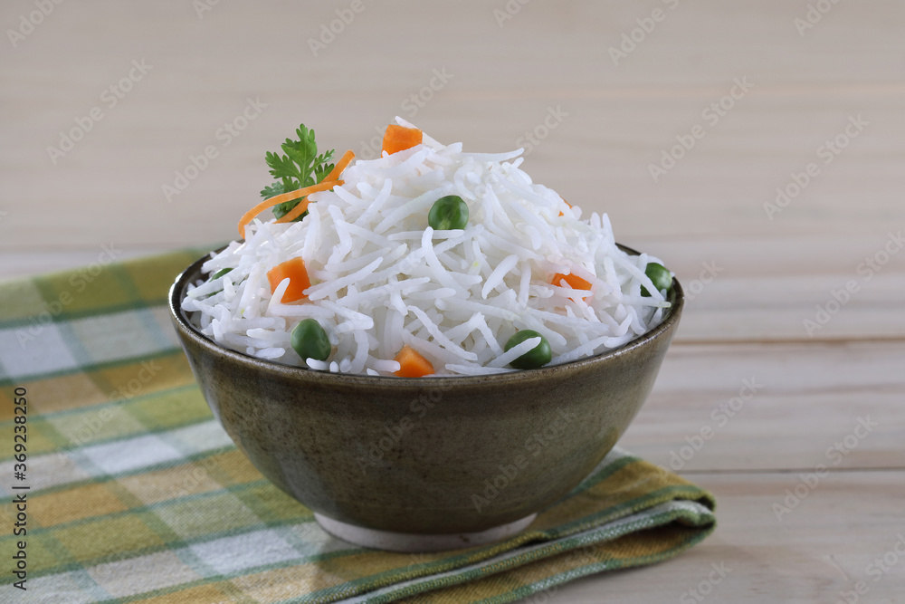Cooked Basmati rice in a bowl. Indian Basmati rice is known for aroma ...
