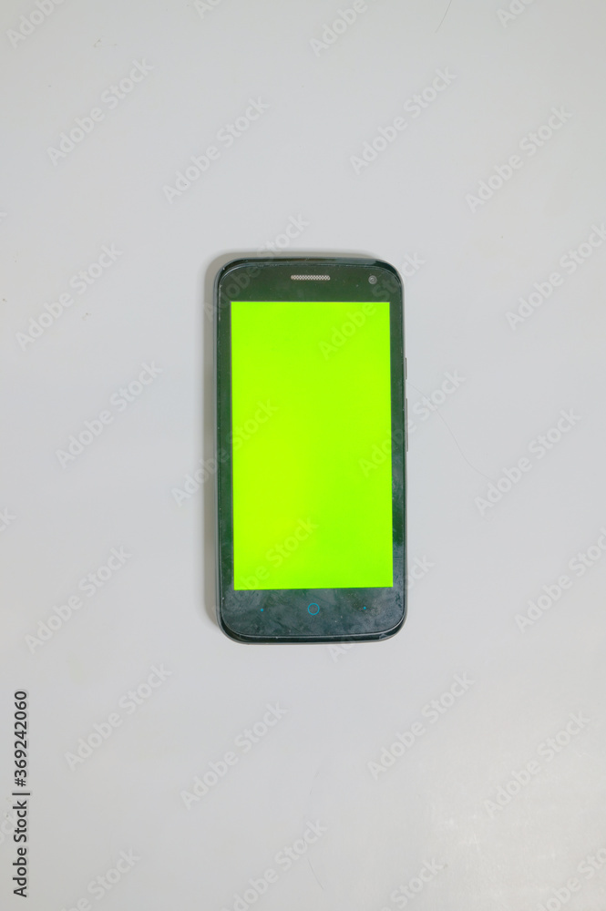 mobile phone with green screen and white background Stock Photo | Adobe ...