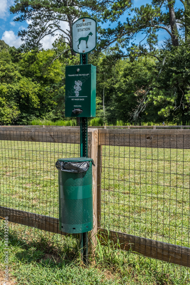 Dog waste station in the park Stock Photo | Adobe Stock