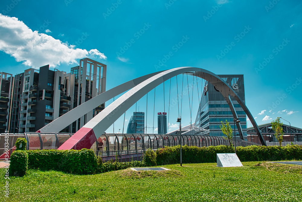Modern cycle and pedestrian footbridge that connects Gino Valle square ...