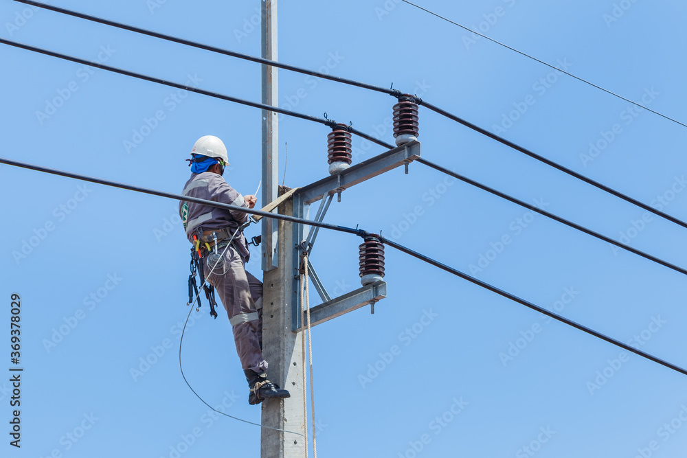 Electricians Wiring Cable repair services,worker in crane truck bucket ...