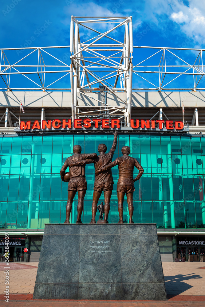 Manchester, UK - May 19 2018: The United Trinity bronze sculpture which ...