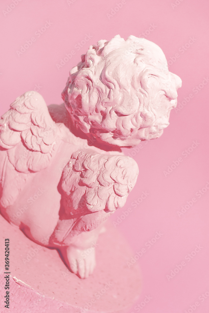 Angel. Minimal still life art. Monochrome trendy colours. Pastel pink ...