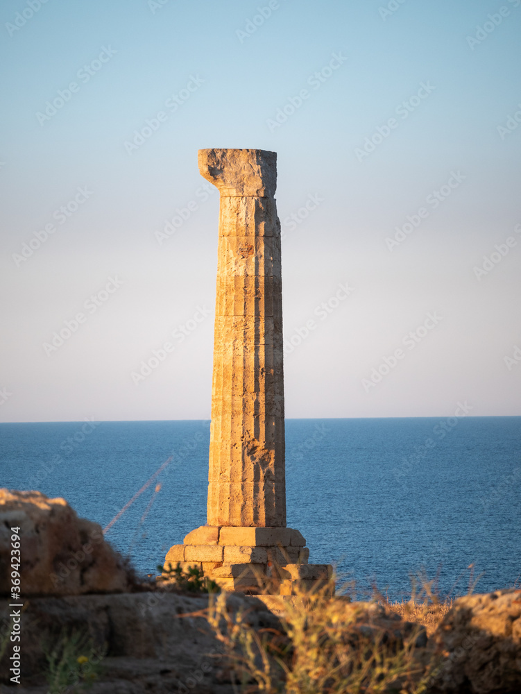 archaeological park of Capo Colonna at sunset, column of the Temple of ...