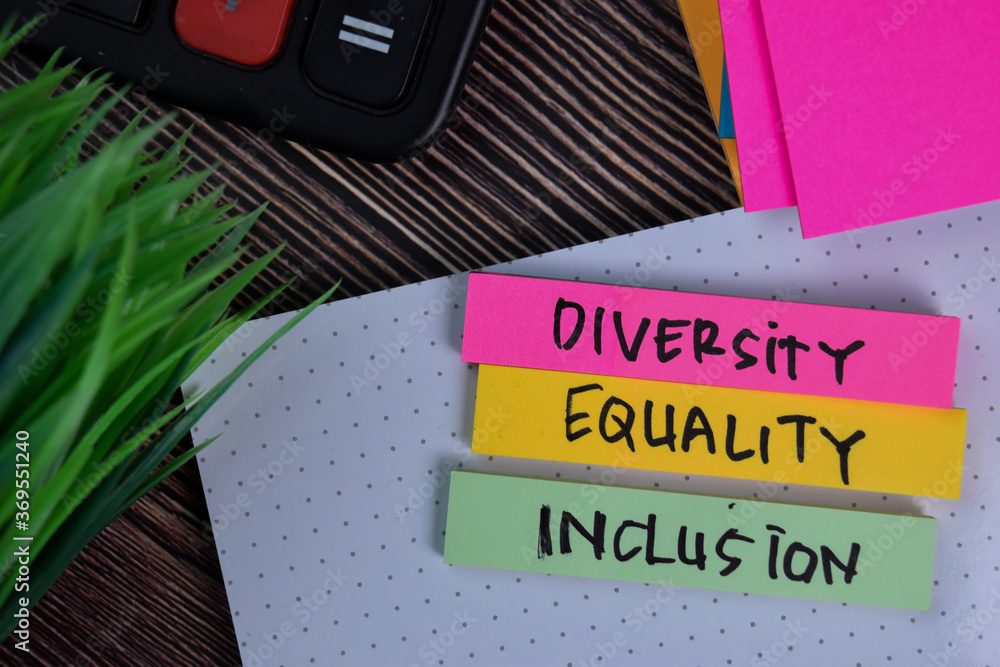Diversity Equality Inclusion write on a sticky note isolated on Office ...