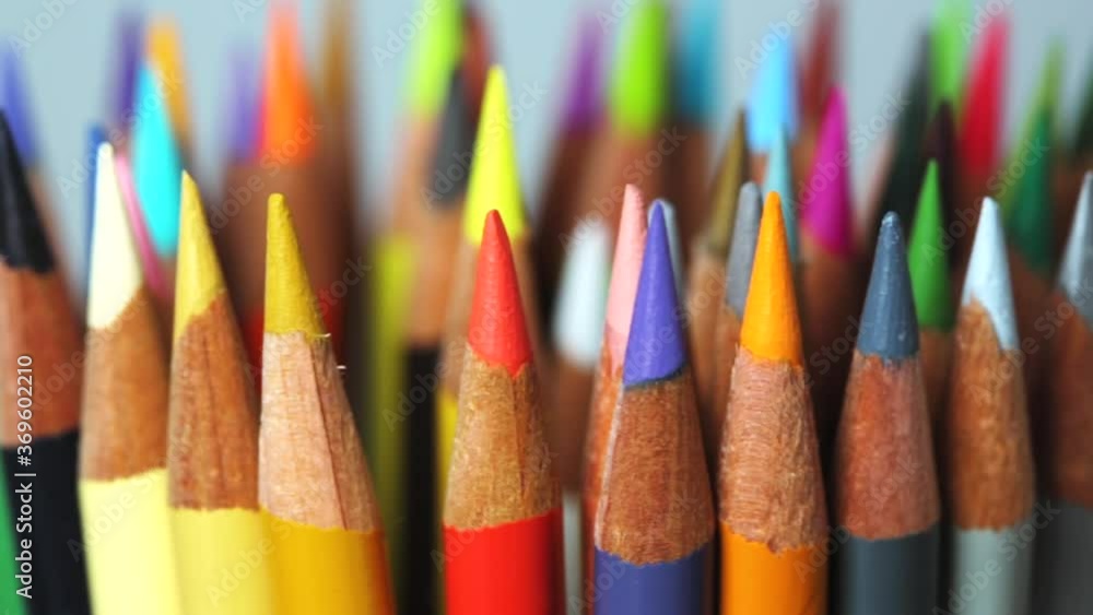 Close-up of sharpened multi-colored pencils for drawing in a circle ...