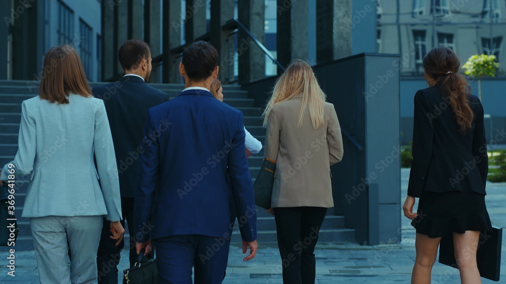 Professional business team of ambitious young office workers going to ...