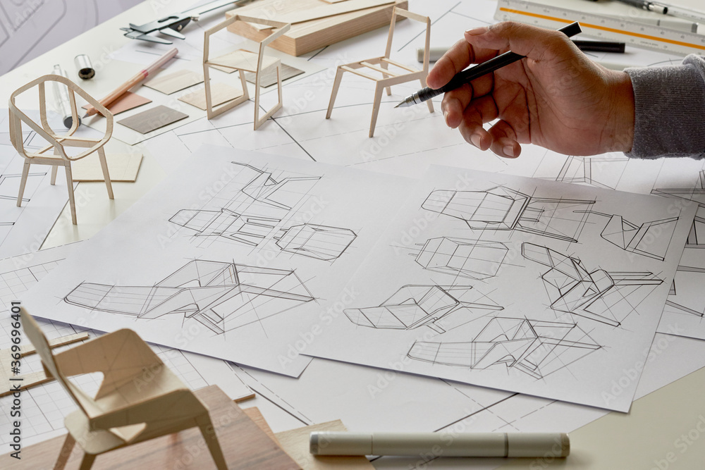 Designer sketching drawing design development product plan draft chair ...