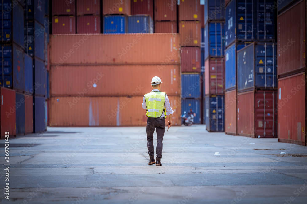 Portrait engineer dock worker under working and checking production ...