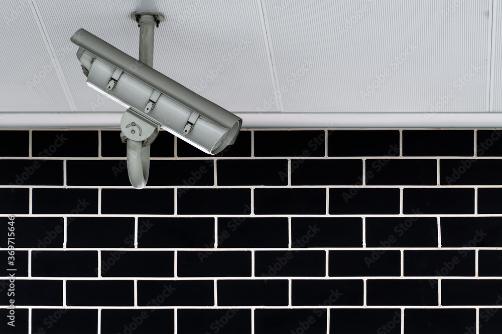 CCTV camera security system installed at the ceiling in front of the ...