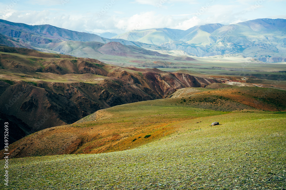 Awesome vivid mountain landscape with deep gorge. Multicolor mountains ...