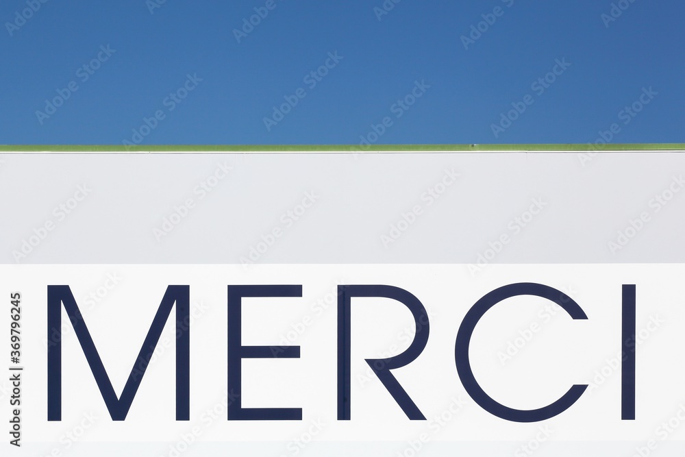 Thank You called merci in french language on a wall in France Stock ...