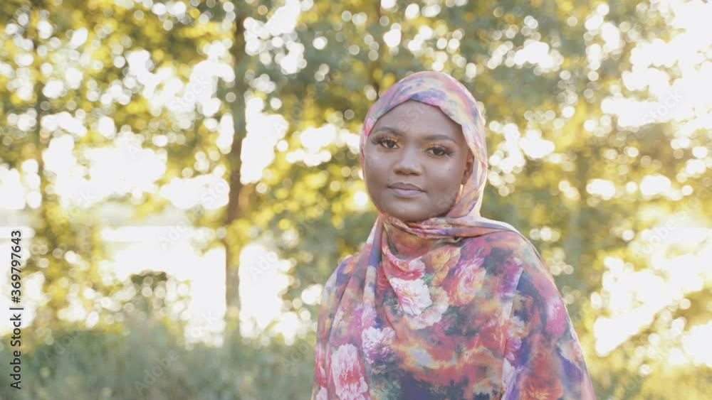 Muslim woman African ethnicity wearing traditional colorful hijab on ...