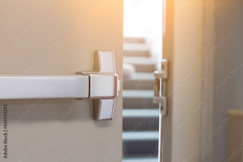 Emergency fire exit door. Push bar and rail for panic exit Stock Photo ...