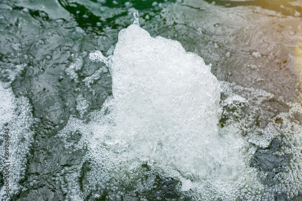 Water flow from the pipes of the fountain, pool pipe waste water ...