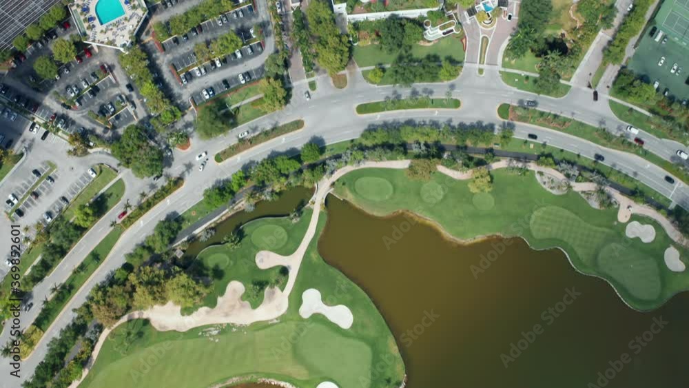 Golf course 4K top down aerial. Prestige residential neighborhood with ...
