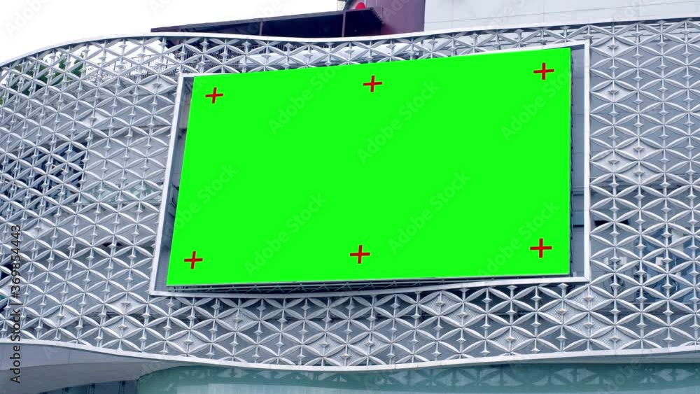 4k Large billboard with a green screen for product or text display ...