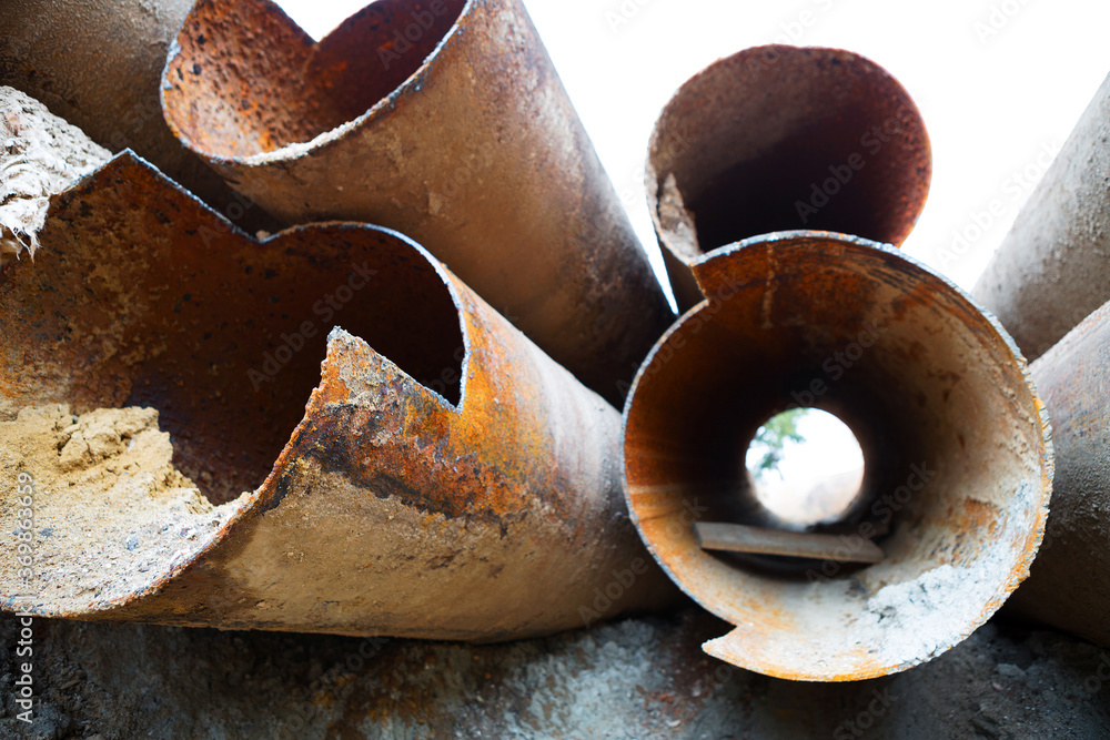Fragments of old large water pipes. After many years of operation ...