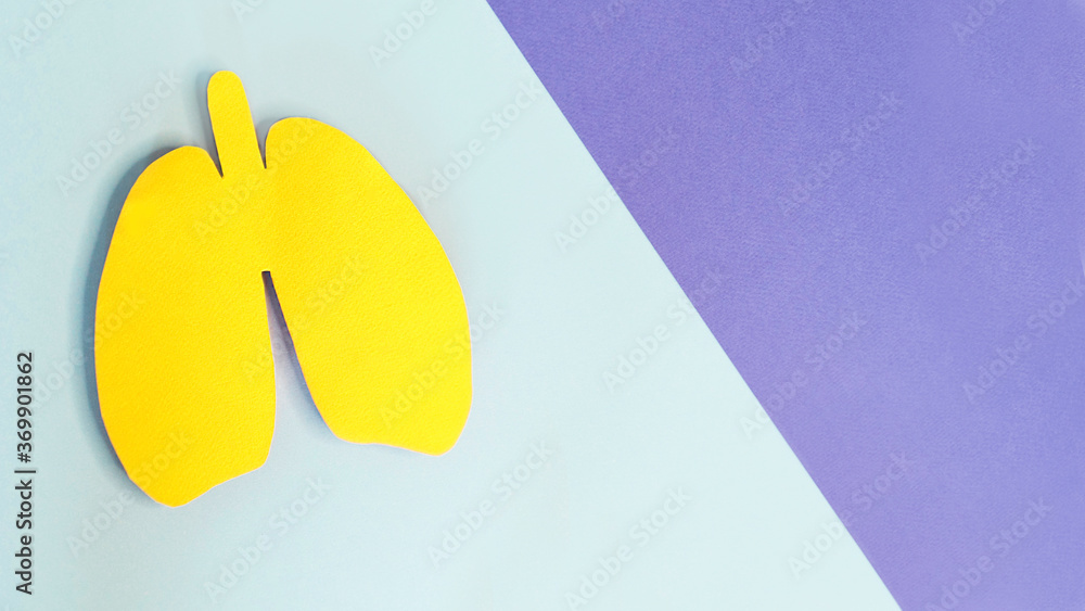 Lung health therapy medical concept. silhouette of yellow paper lungs ...