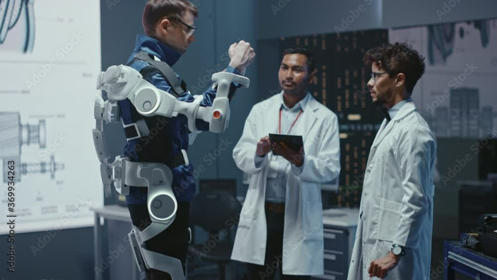 In Robotics Development Laboratory: Engineers and Scientists Work on a ...