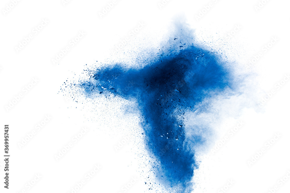 Abstract blue powder explosion on white background. Blue dust particles ...