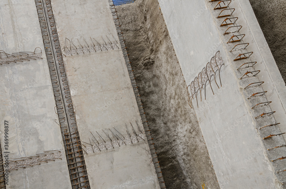 Close-up view of a huge construction surrounding wall or tilt-up panel ...