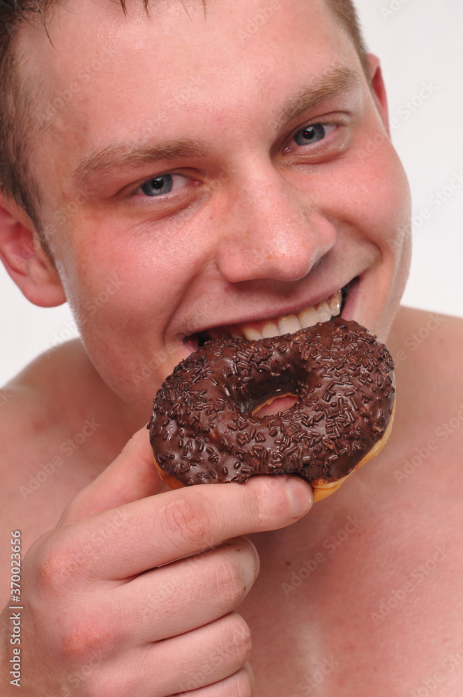 Bodybuilder with a donut Stock Photo | Adobe Stock