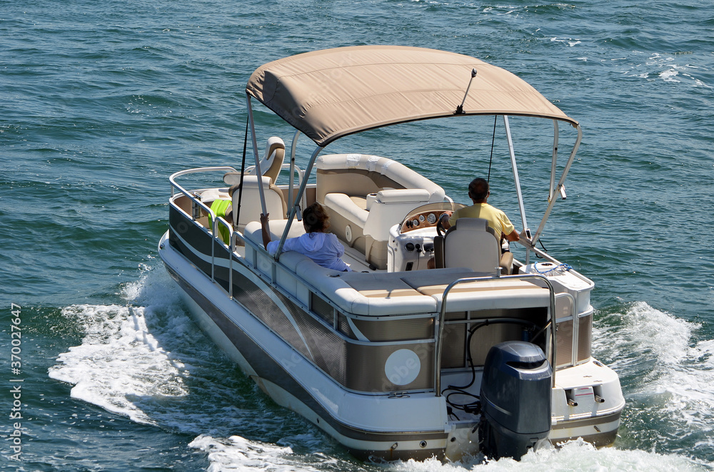 Open upscale motorboat cruising on the Florida Intra-Coastal Waterway ...