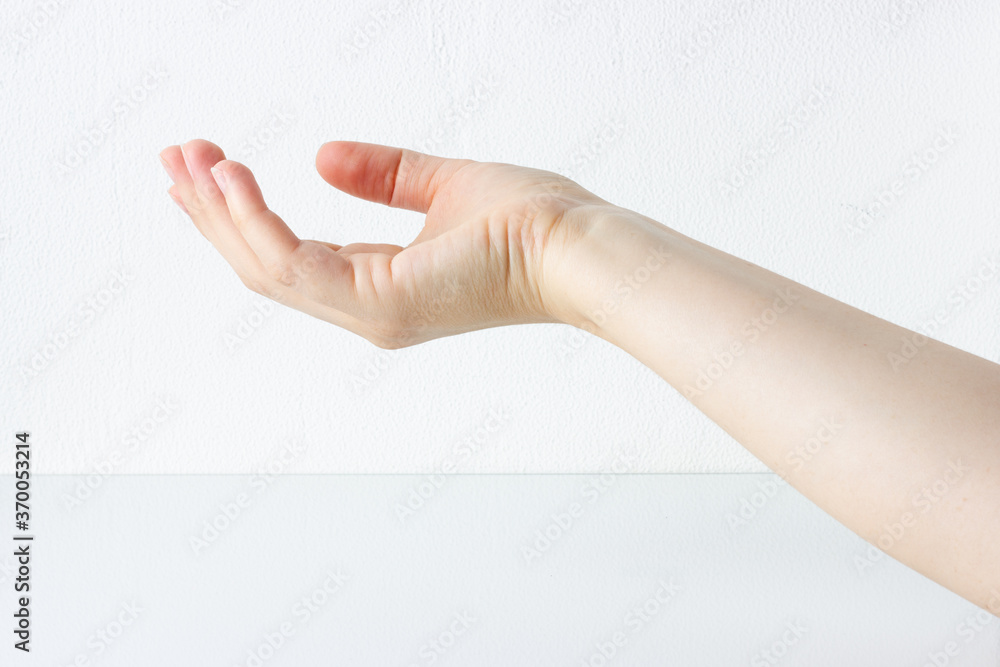 Woman's hand outstretched, woman lends a helping hand or need help ...