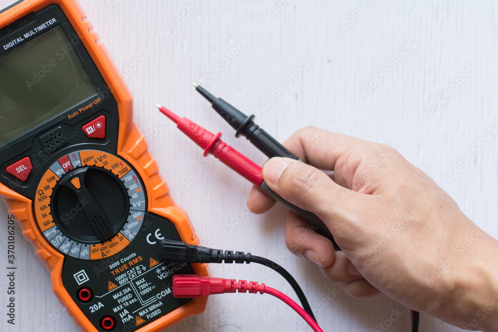 A multi meter or a multi-tester is an electronic measuring instrument ...