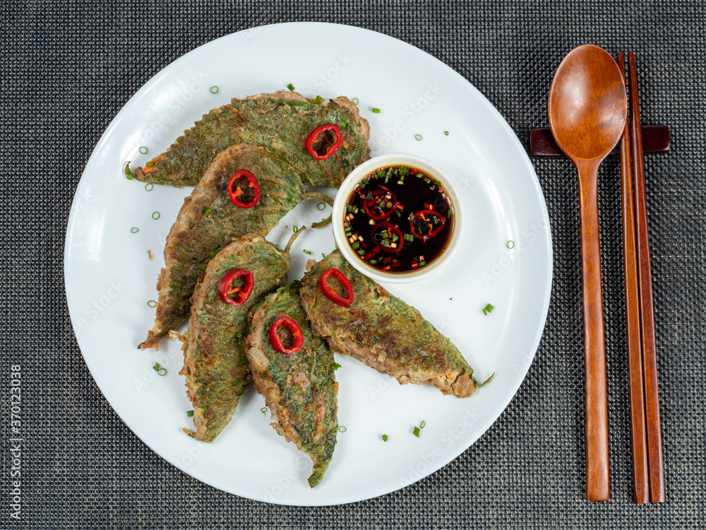 Korean food : Kkaennipjeon. Half-folded perilla leaves stuffed with a ...
