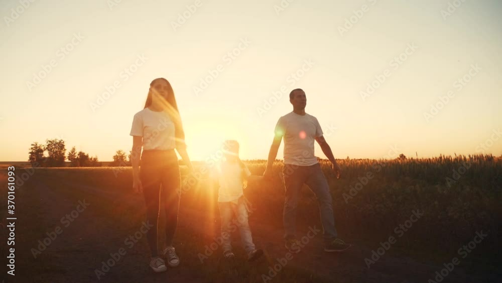 Video Stock happy family fun walks at sunset in the field with wheat ...