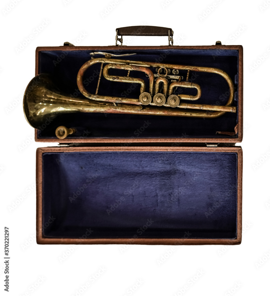 old trumpet music in open case. Pocket trumpet in a case isolated on ...