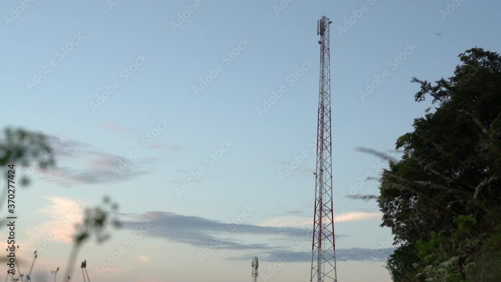 Telecommunication tower 5G with radio antennas in a green environment ...