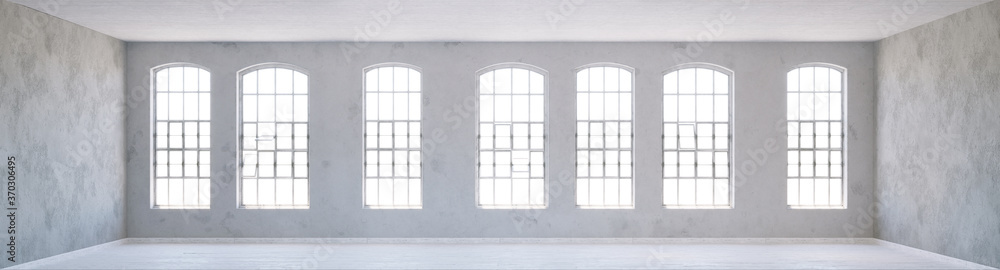 Large empty room in loft style with big windows illuminated by sunlight ...