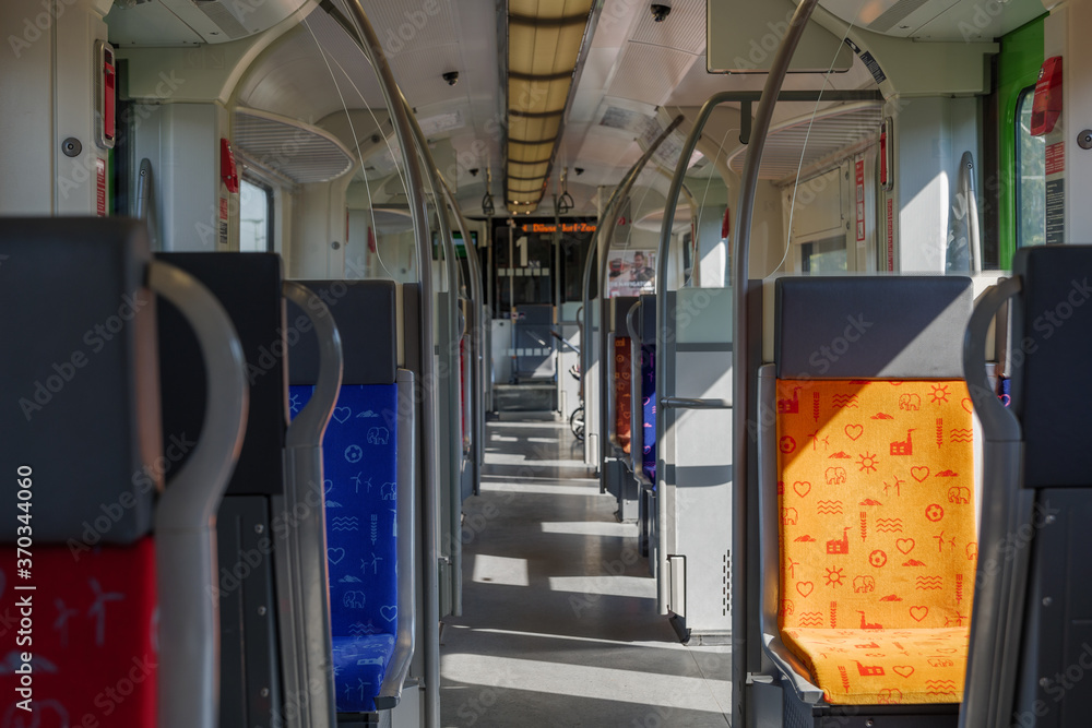 Interior view of a corridor inside passenger trains with colourful ...
