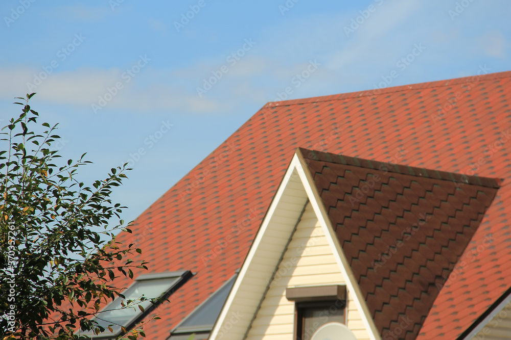 icon roof with new brown roofing tiles on residential property. banner ...