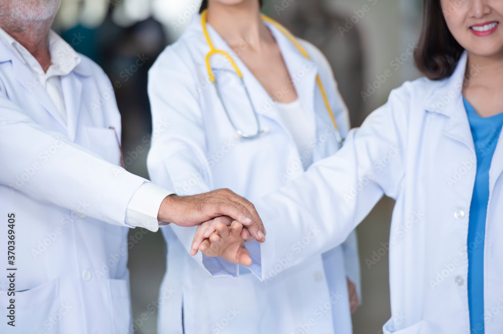 Cooperation of people in the medical community with a hands together ...