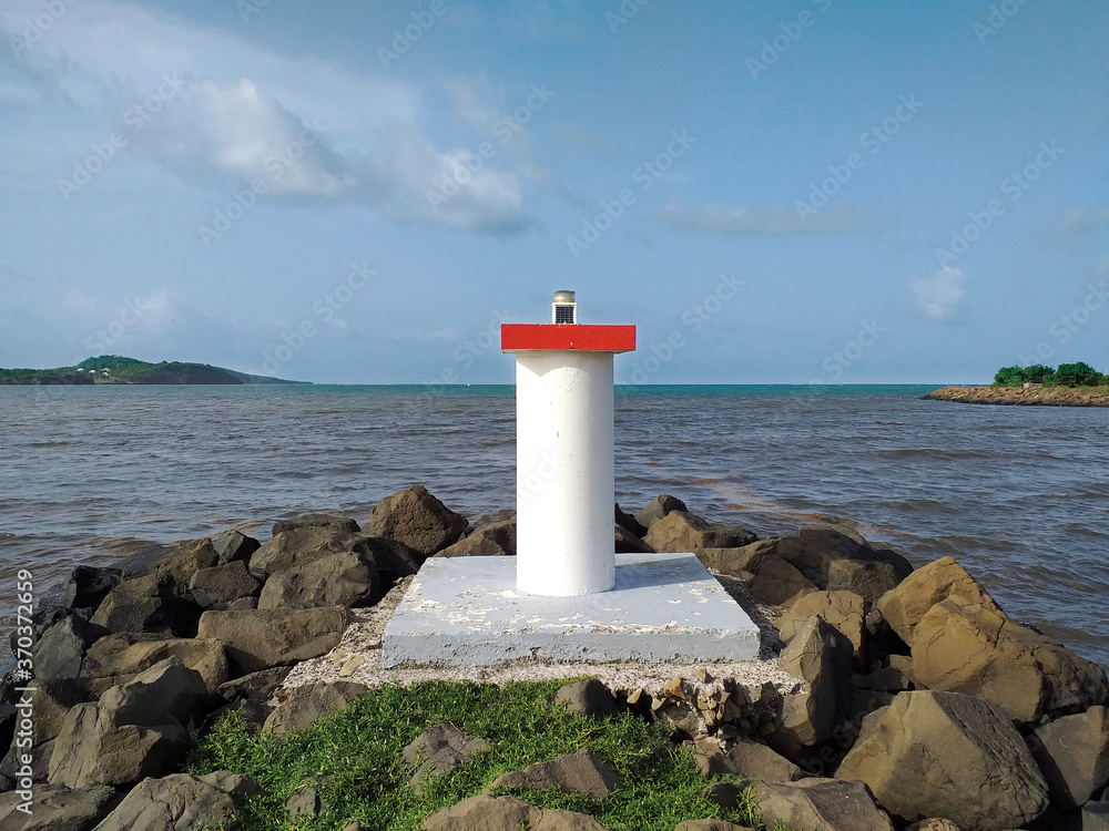 Port entrance signaling light. Entrance through Bocana with red port ...